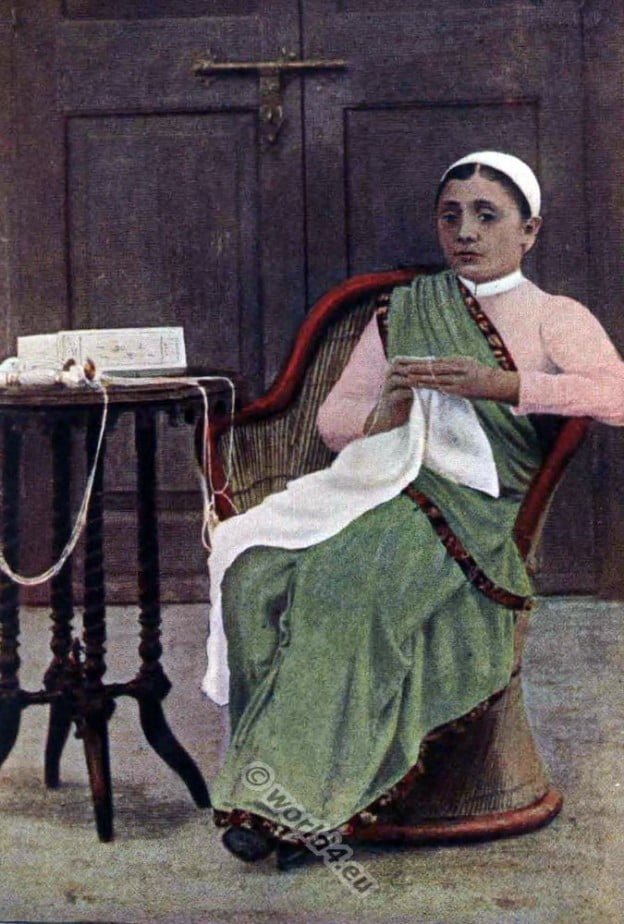 A Parsee Lady in walking costume with the mathabana over the hair.