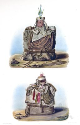 Front views of two mummies from a common tomb.